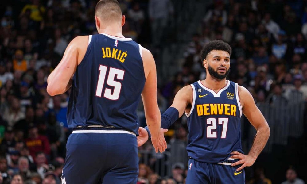 Nuggets' Nikola Jokic playfully tosses Jamal Murray into pool after NBA ...